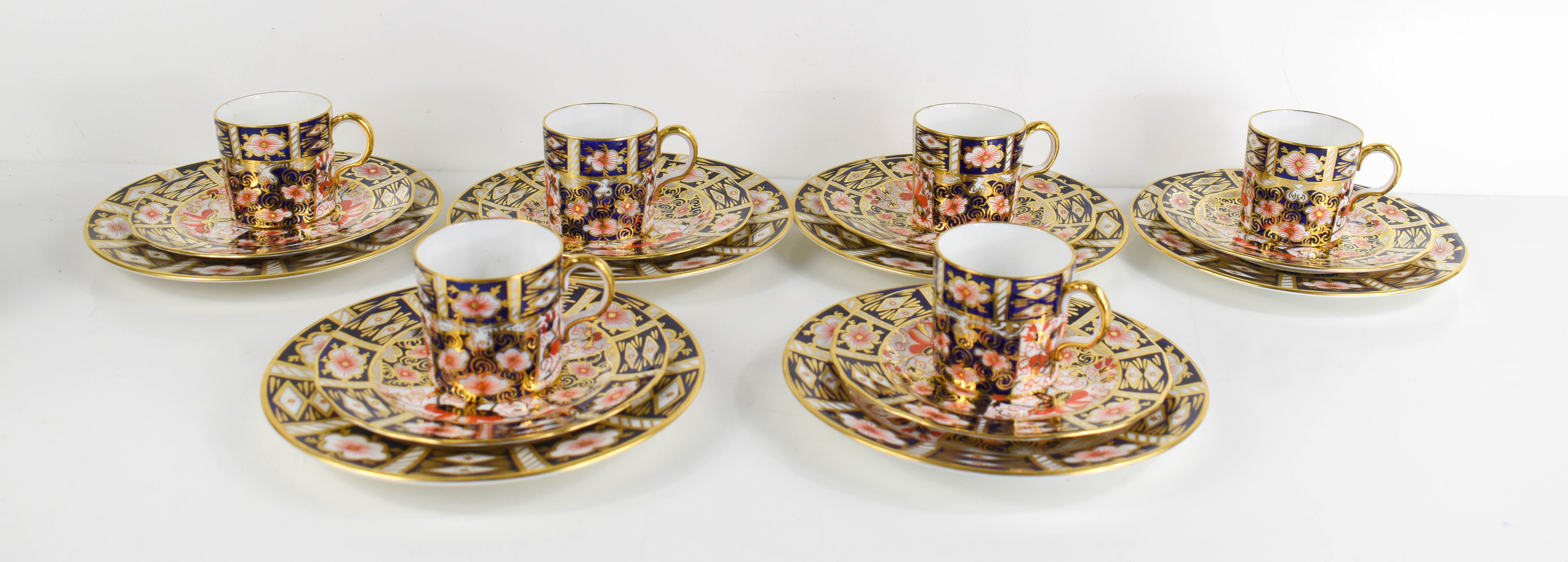 Lot 140 - A set of six Royal Crown Derby coffee cans