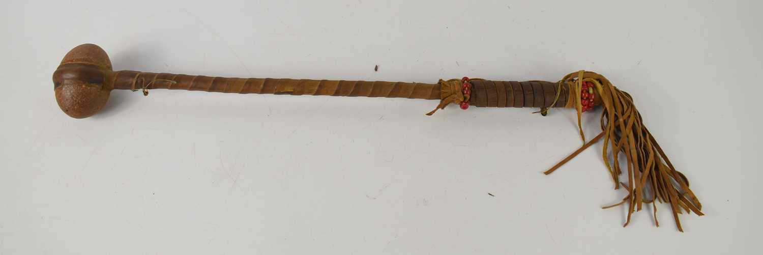 Lot 392 - A Native American stone war club, the ovoid