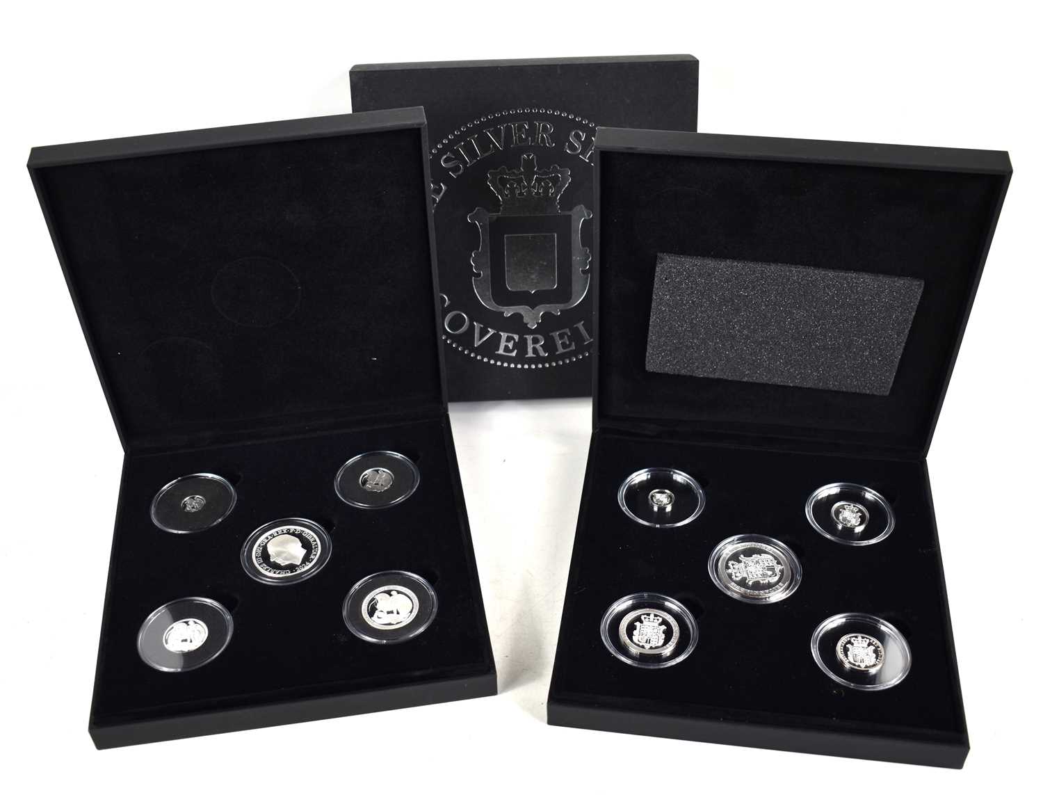 Lot 277 - Two silver proof sovereign five coin sets,