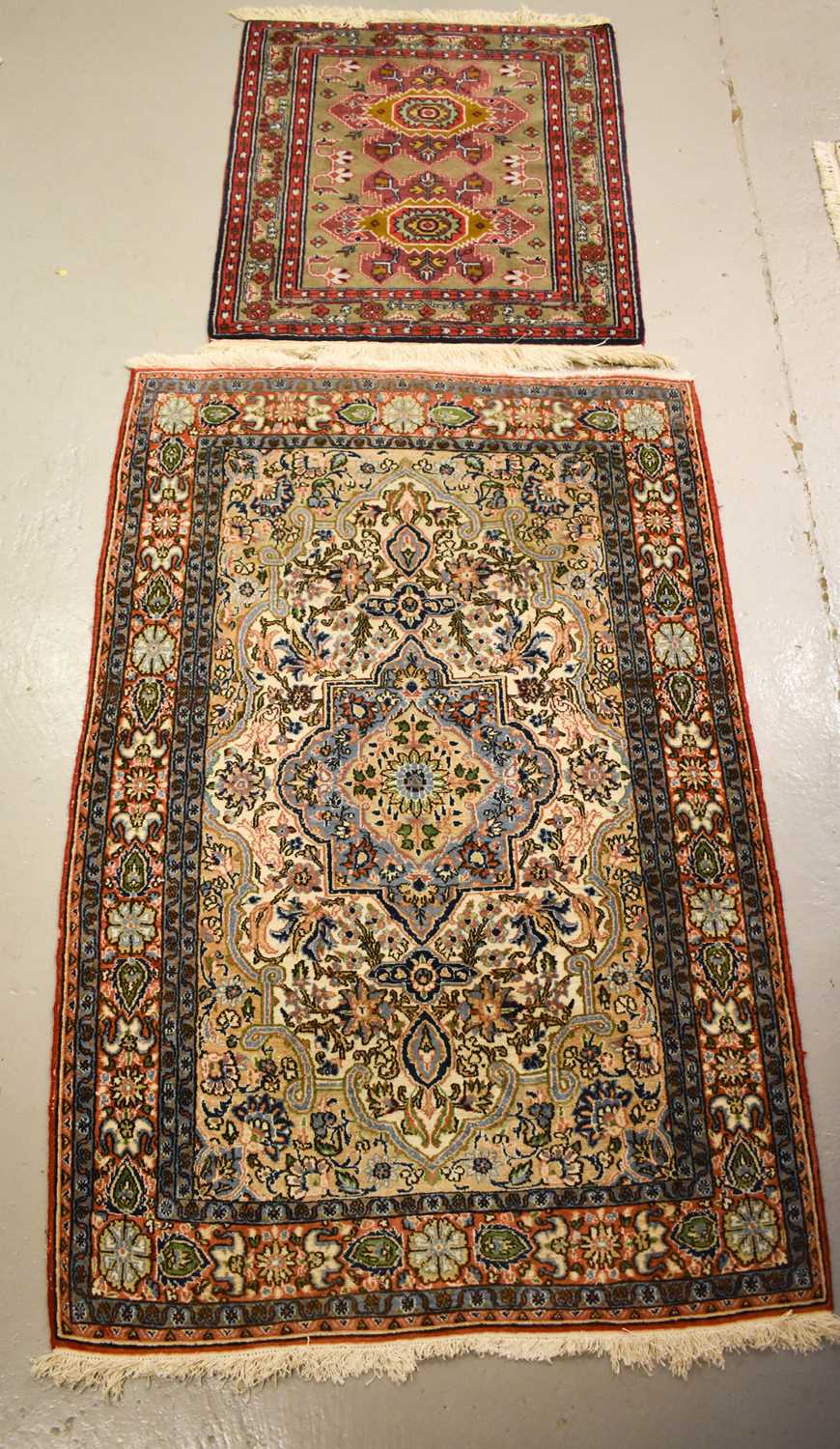 Lot 486 - Two Middle eastern rugs the smaller having a