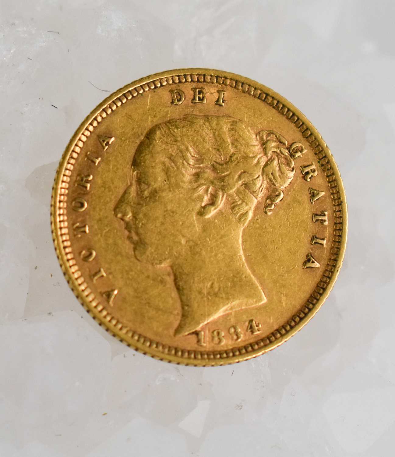 Lot 232 - A young Victoria head, shield back half