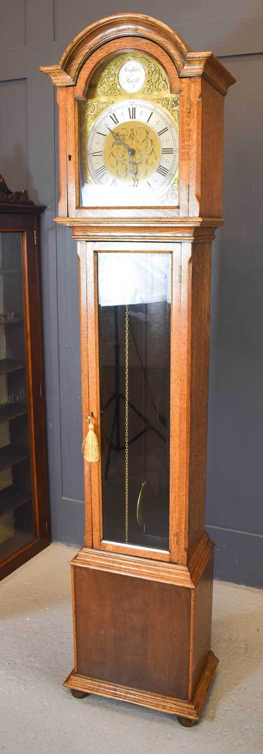 Lot 295 - A reproduction oak cased grandmother clock,