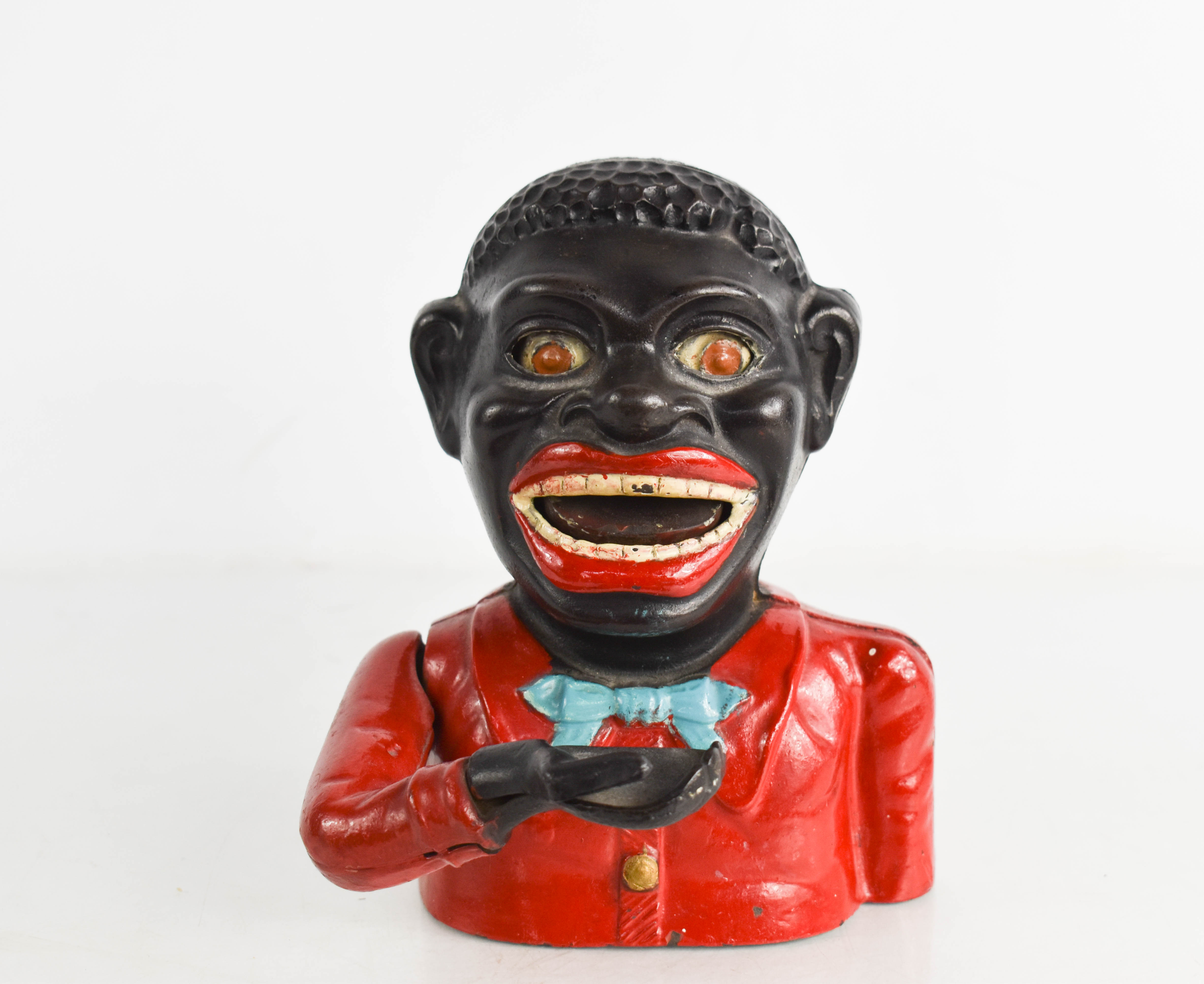 Lot 66 - A Vintage cast iron 'Greedy Boy' money box.