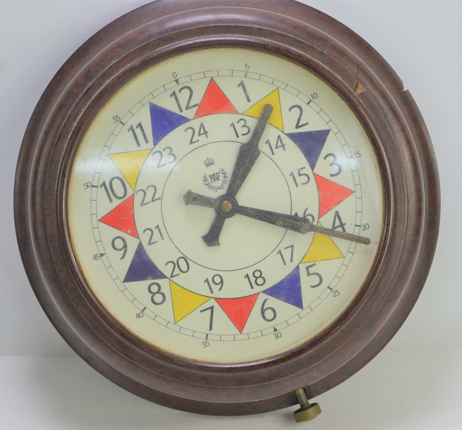 Lot 287 - An RAF electric wall clock in a bakelite