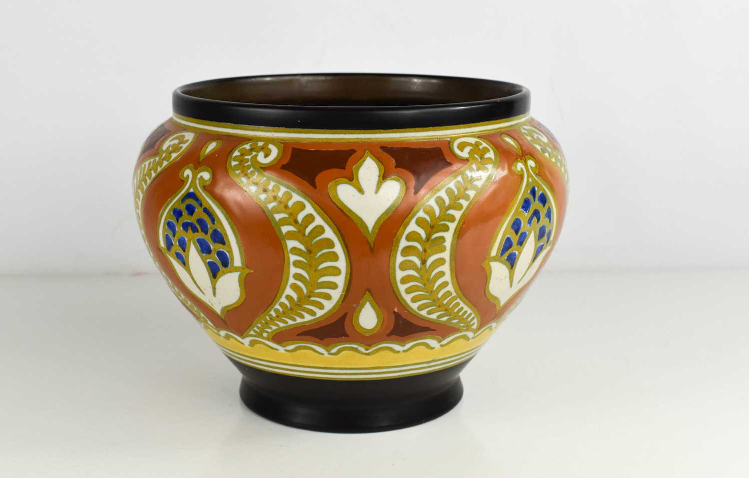 Lot 16 - A Gouda Holland pottery bowl, with ochre and