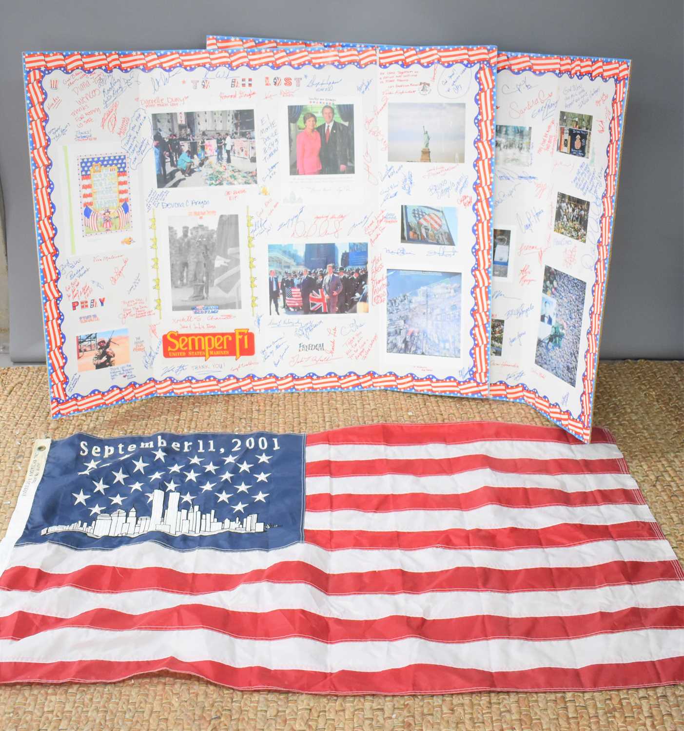 Lot 236 - A group of 9/11 commemorative memorabilia to