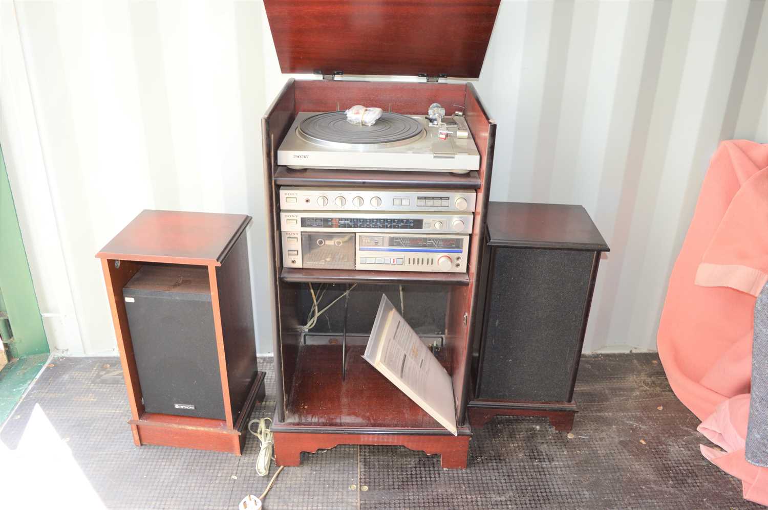 Lot 606 - A vintage Sony hi-fi system with record