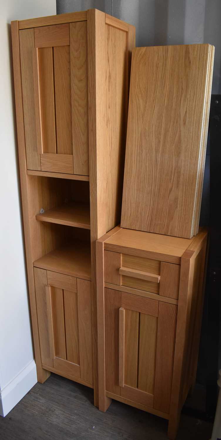 Lot 240 - Two beech John Lewis cabinets.