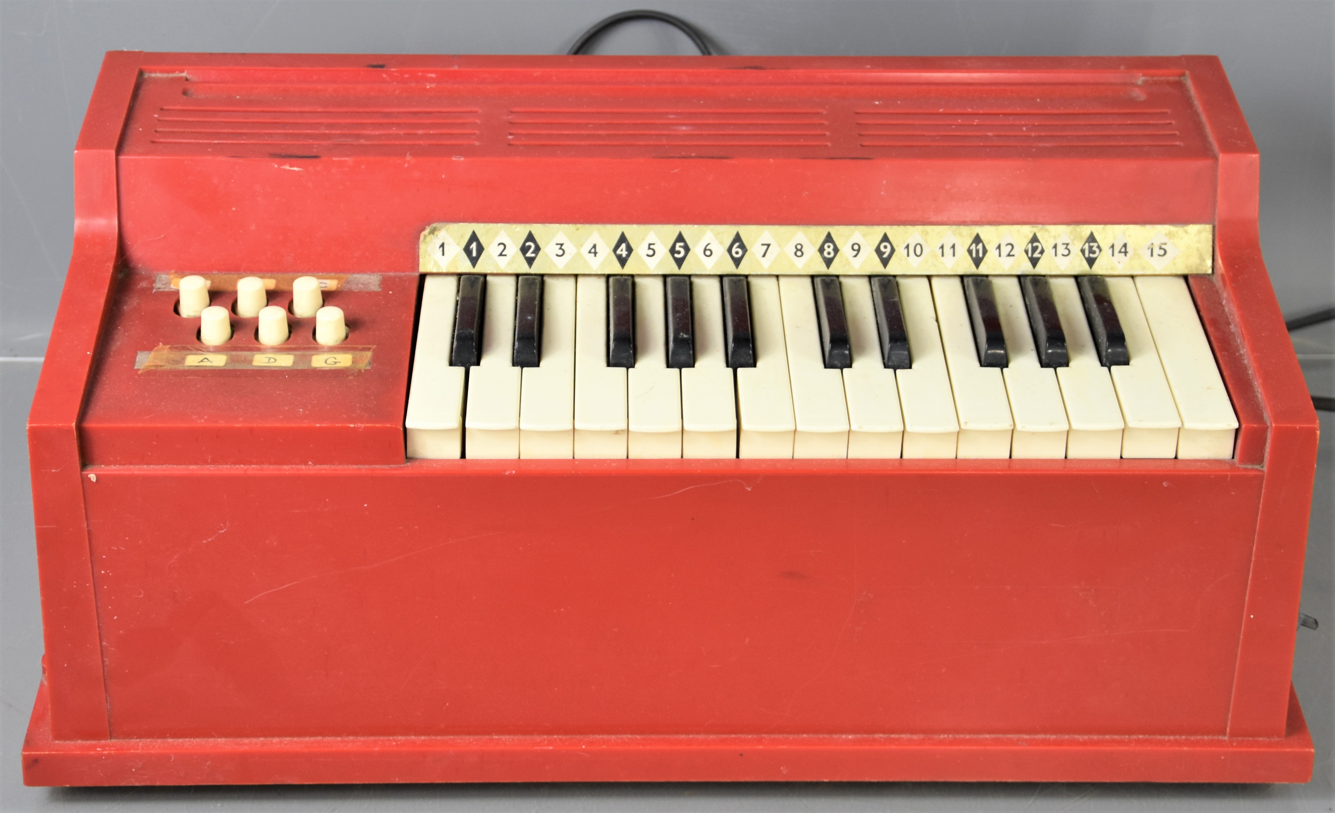 Lot 321 - A vintage electric childs organ possibly
