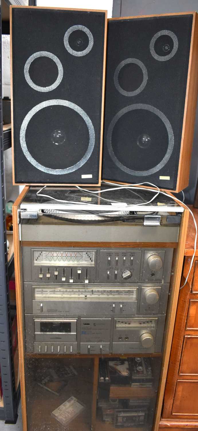 Lot 397 - A vintage Amstrad hi-fi system with record