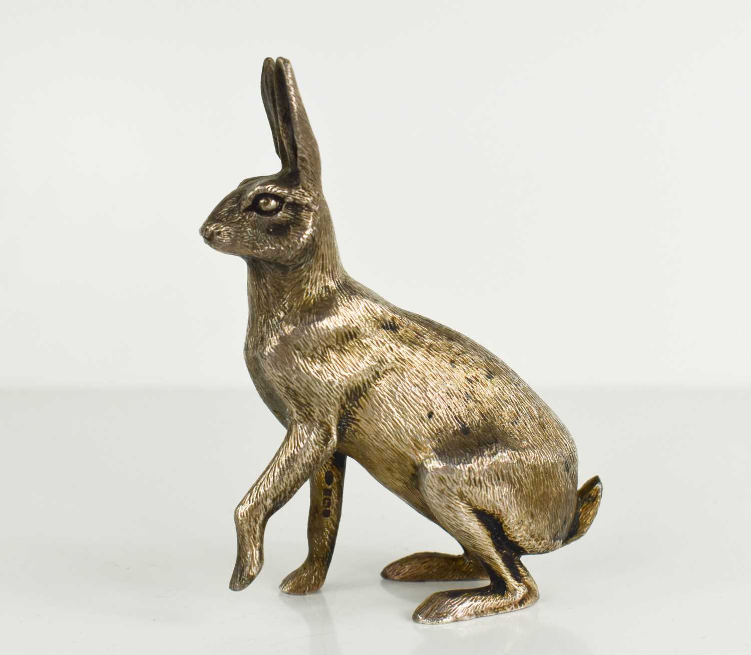 Lot 454 - A solid silver hare, engraved with fine