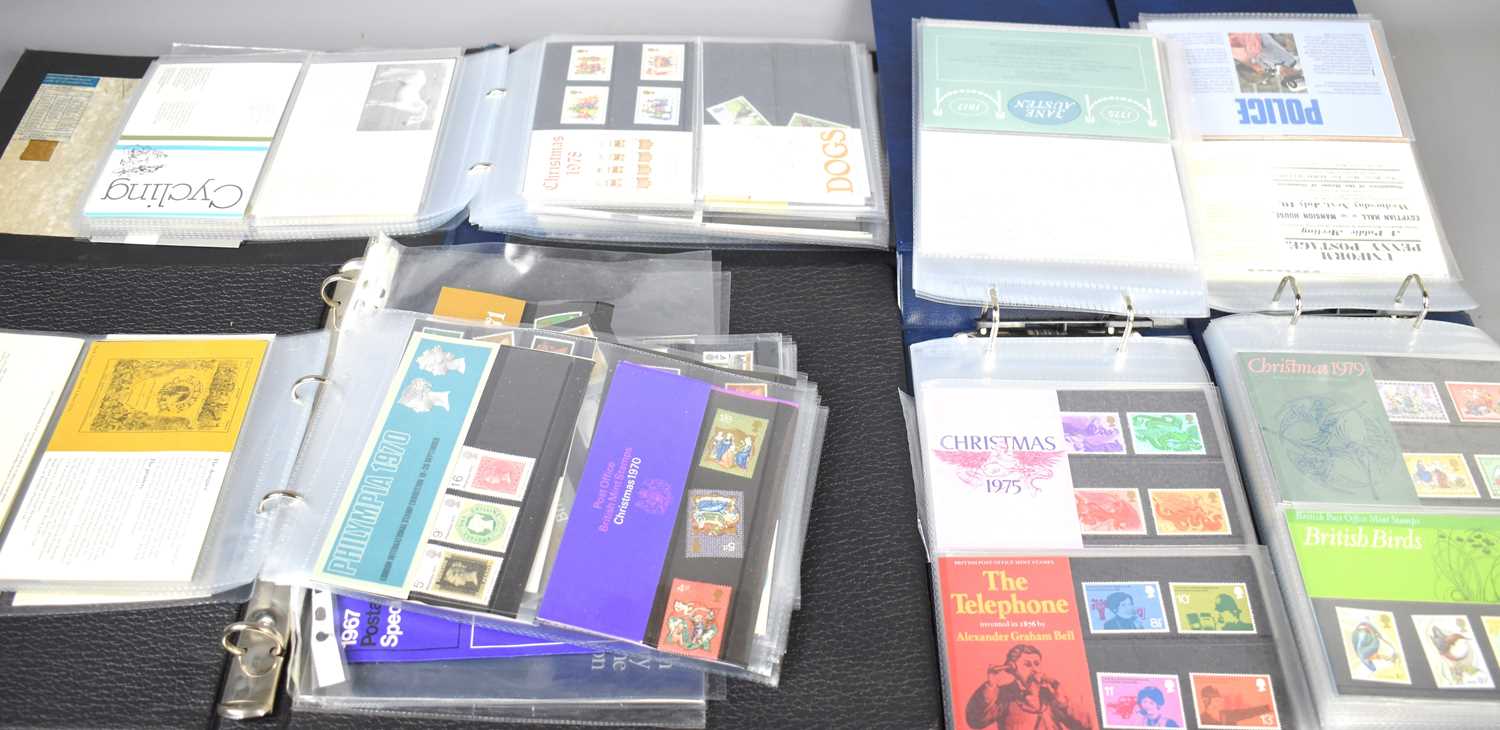 Lot 281 - Four albums of mint stamp presentation packs